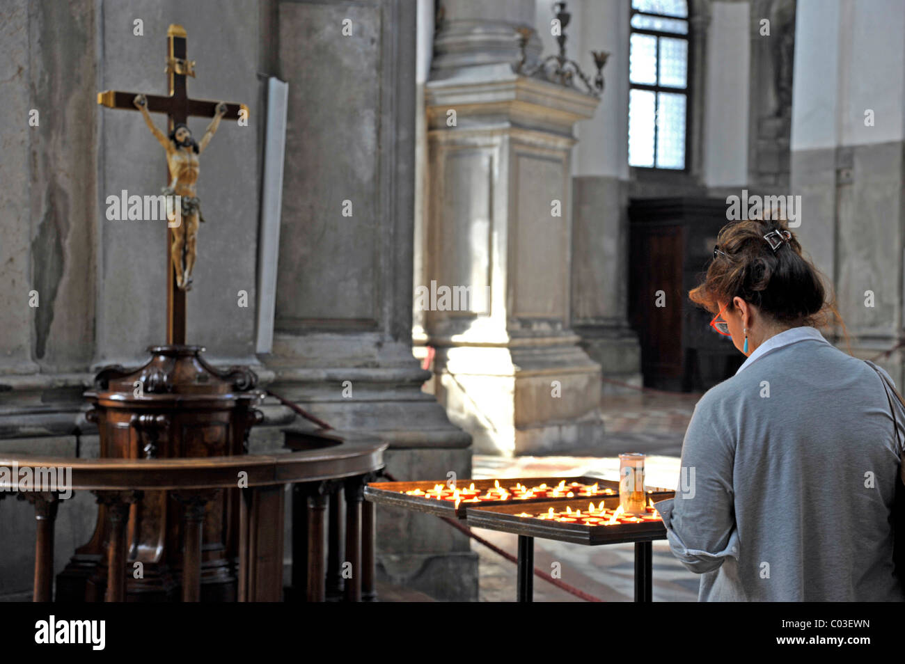 Women praying in catholic church hi-res stock photography and images ...