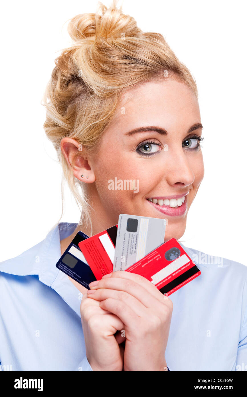 Attractive young woman shopping with credit card happy and smiling ...