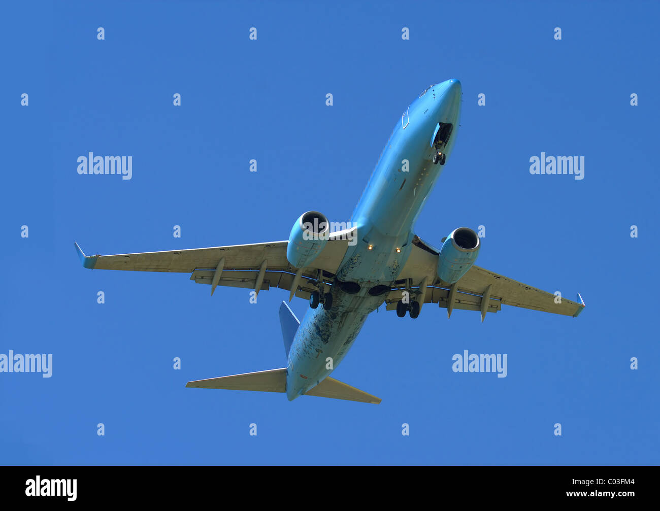 jet plane in a blue sky Stock Photo - Alamy