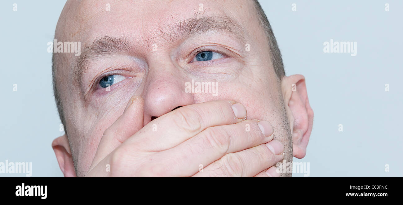 A man with a thinking expression Stock Photo - Alamy