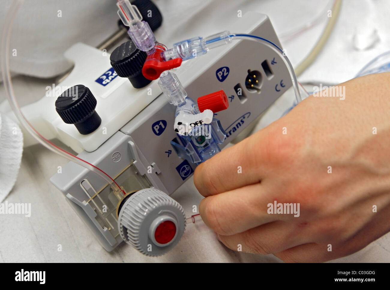 Setting the valves of the various infusions of a patient before surgery ...