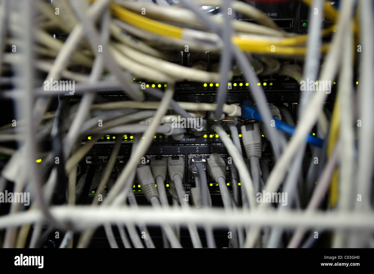Network switch full of ethernet cables in server room Stock Photo - Alamy