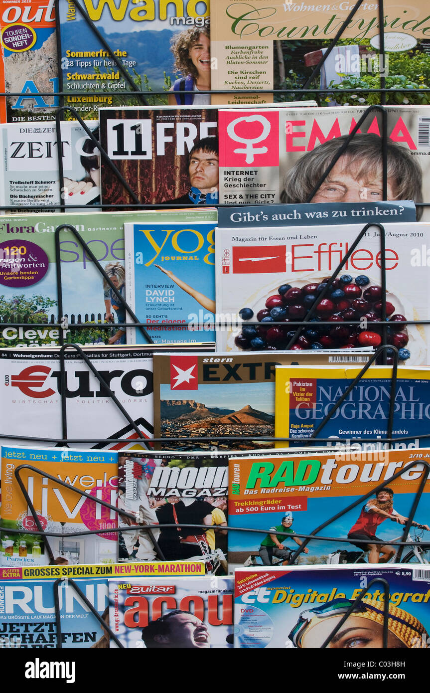 German magazines for sale on a magazine rack Stock Photo - Alamy