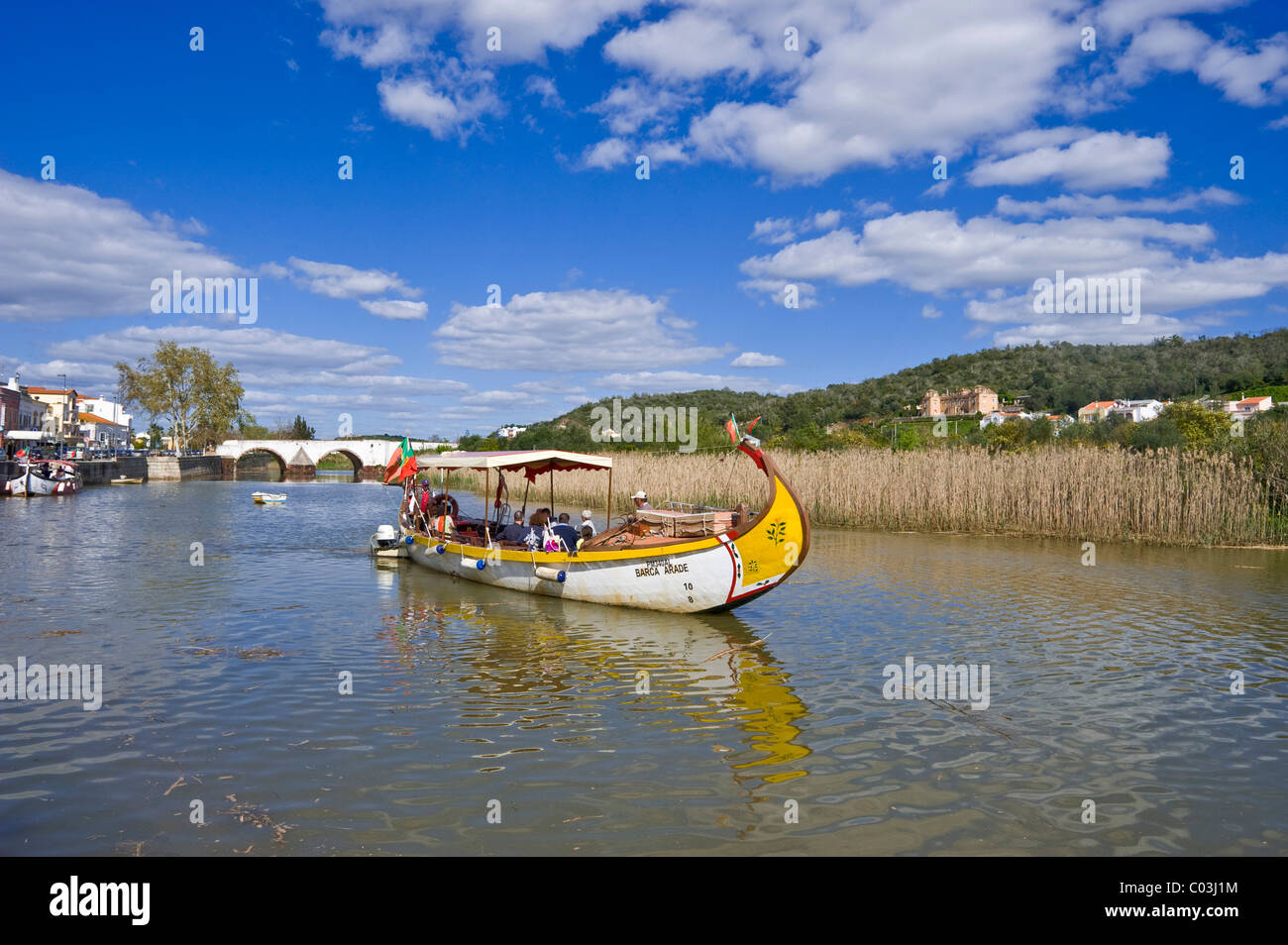 Historic fishing boat as a tourist boat on the Rio Arade river, Silves ...