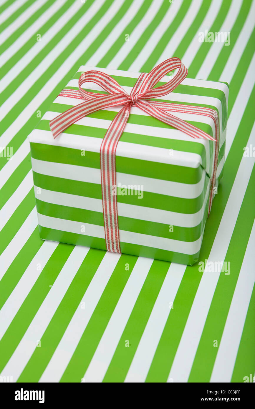 Wrapped presents ribbon striped paper hi-res stock photography and ...