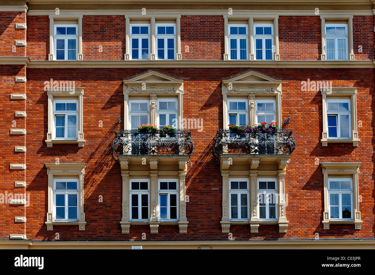 Brick house iron balconies hi-res stock photography and images - Alamy