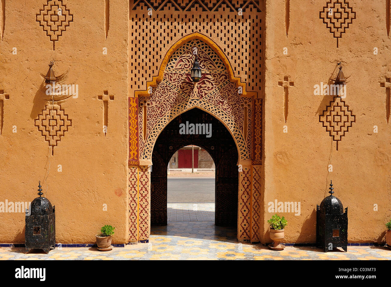 Entrance gate to a kasbah, mud fortress or residence of the Berber ...
