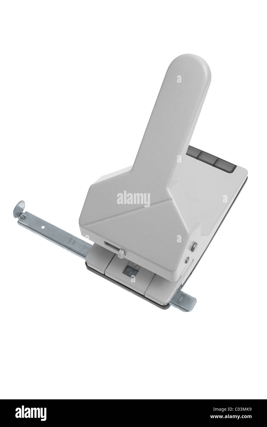 White hole puncher isolated on white background Stock Photo - Alamy