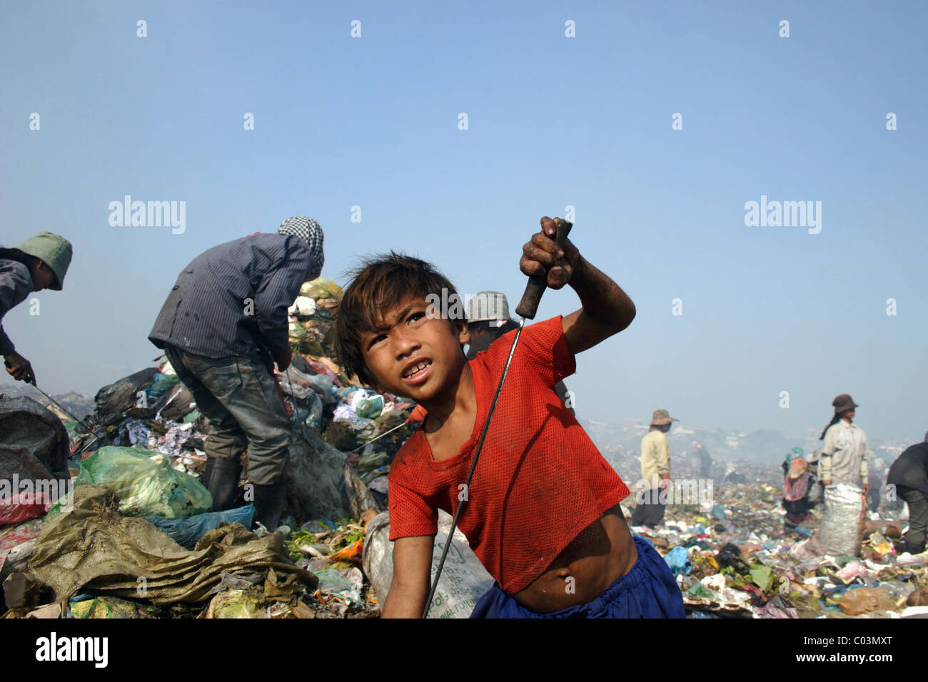 Child work garbage hi-res stock photography and images - Alamy