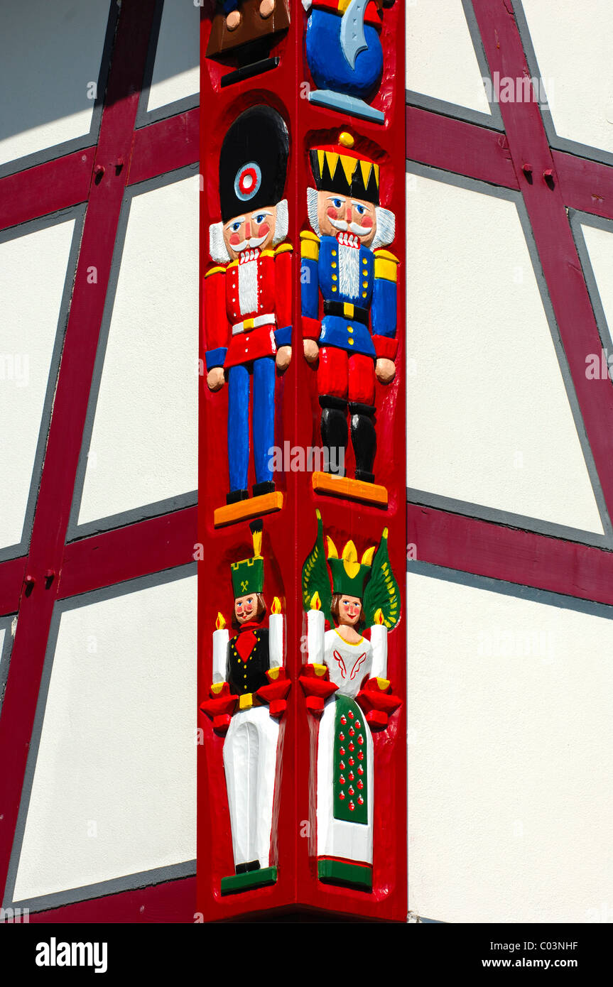 Wood carvings of typical Christmas motifs at the timber of a ...