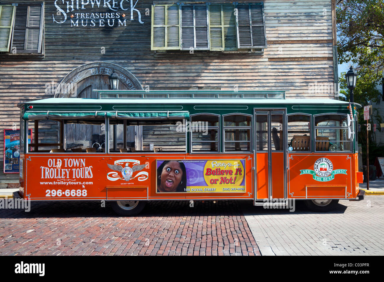 Key West Tour Bus in front of the Shipwreck Museum, Key West, Florida ...