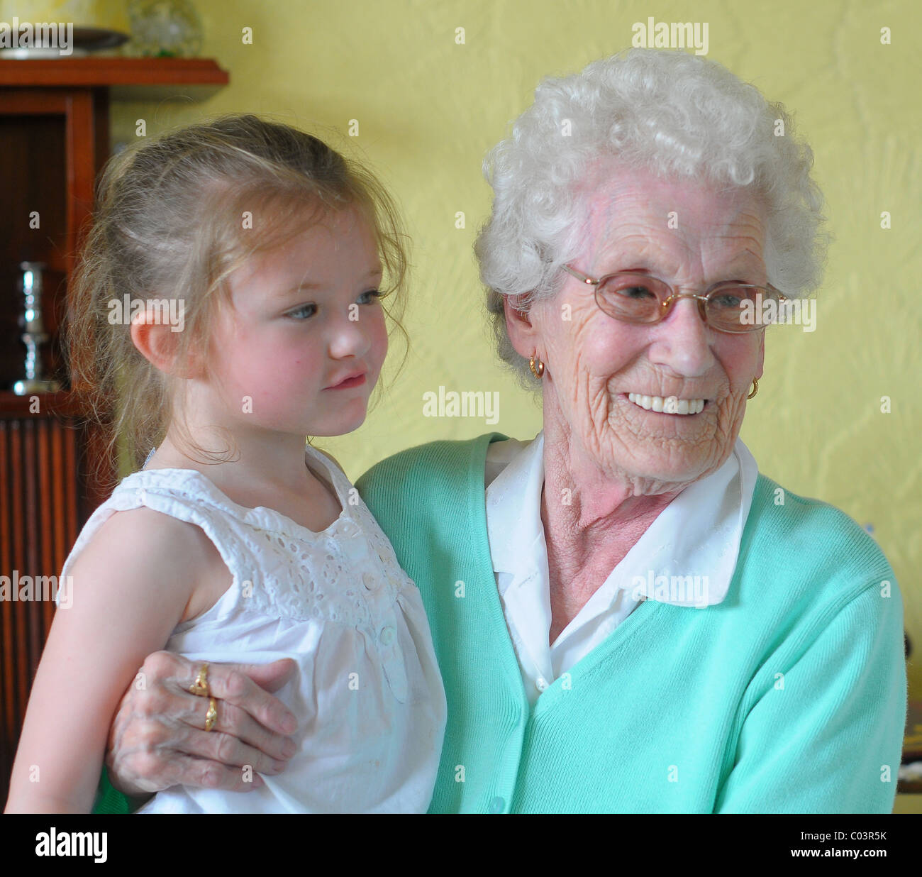 Family day with grandma Stock Photo - Alamy