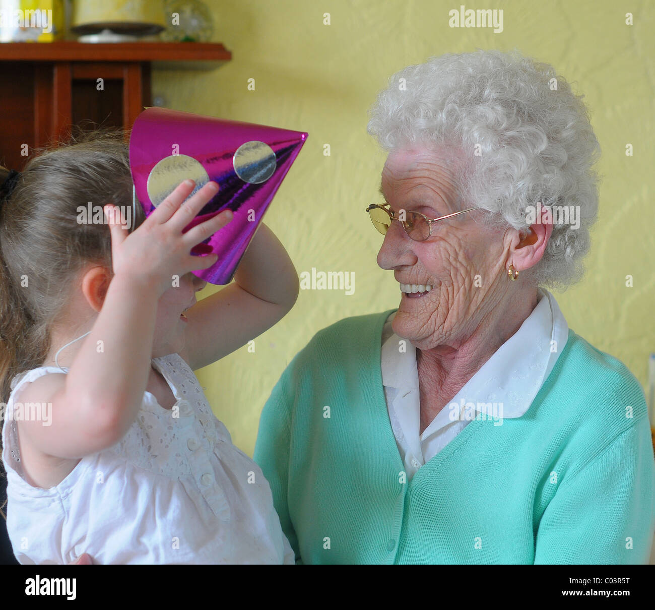 Family day with grandma Stock Photo - Alamy