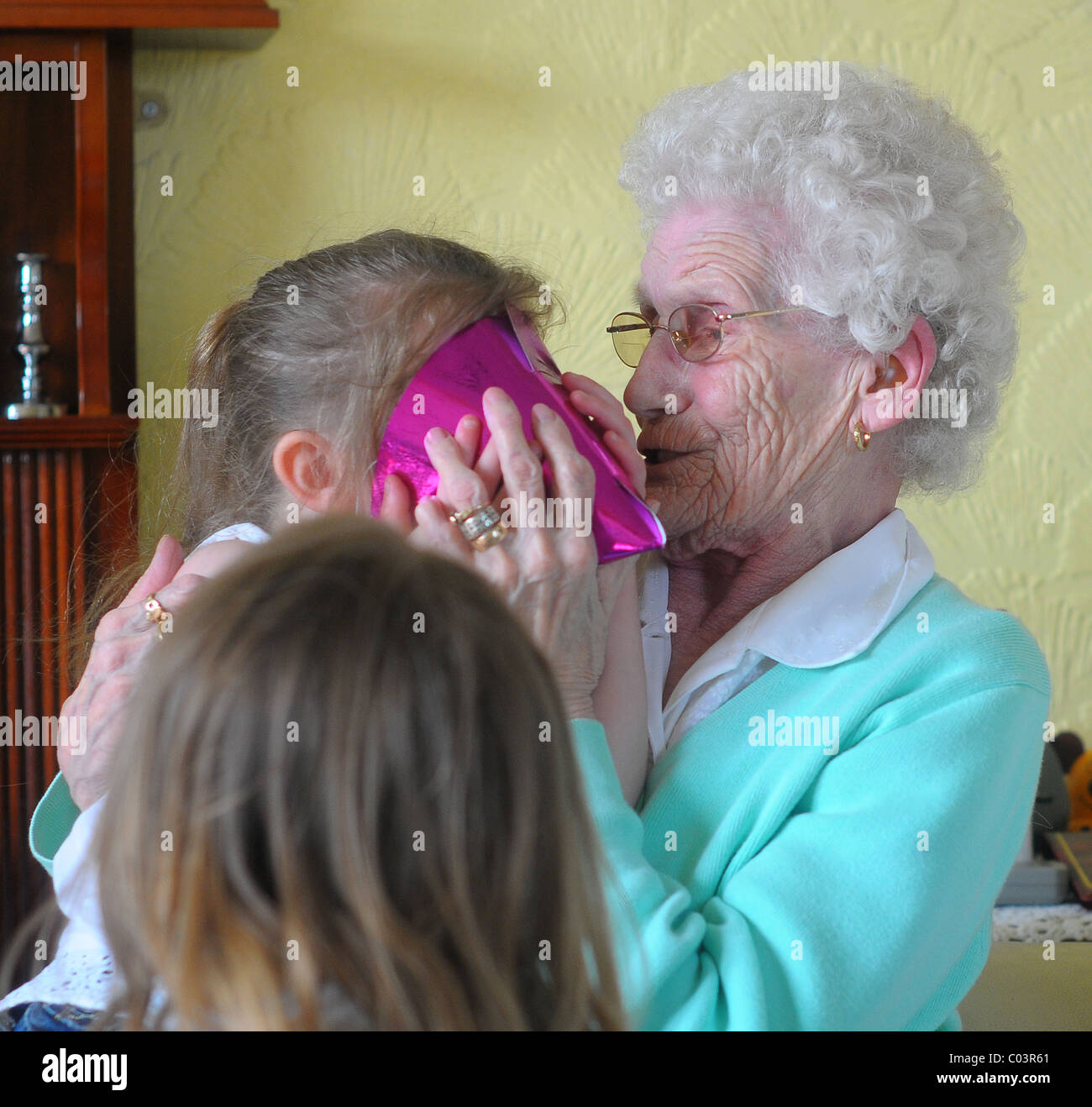 Family day with grandma Stock Photo - Alamy