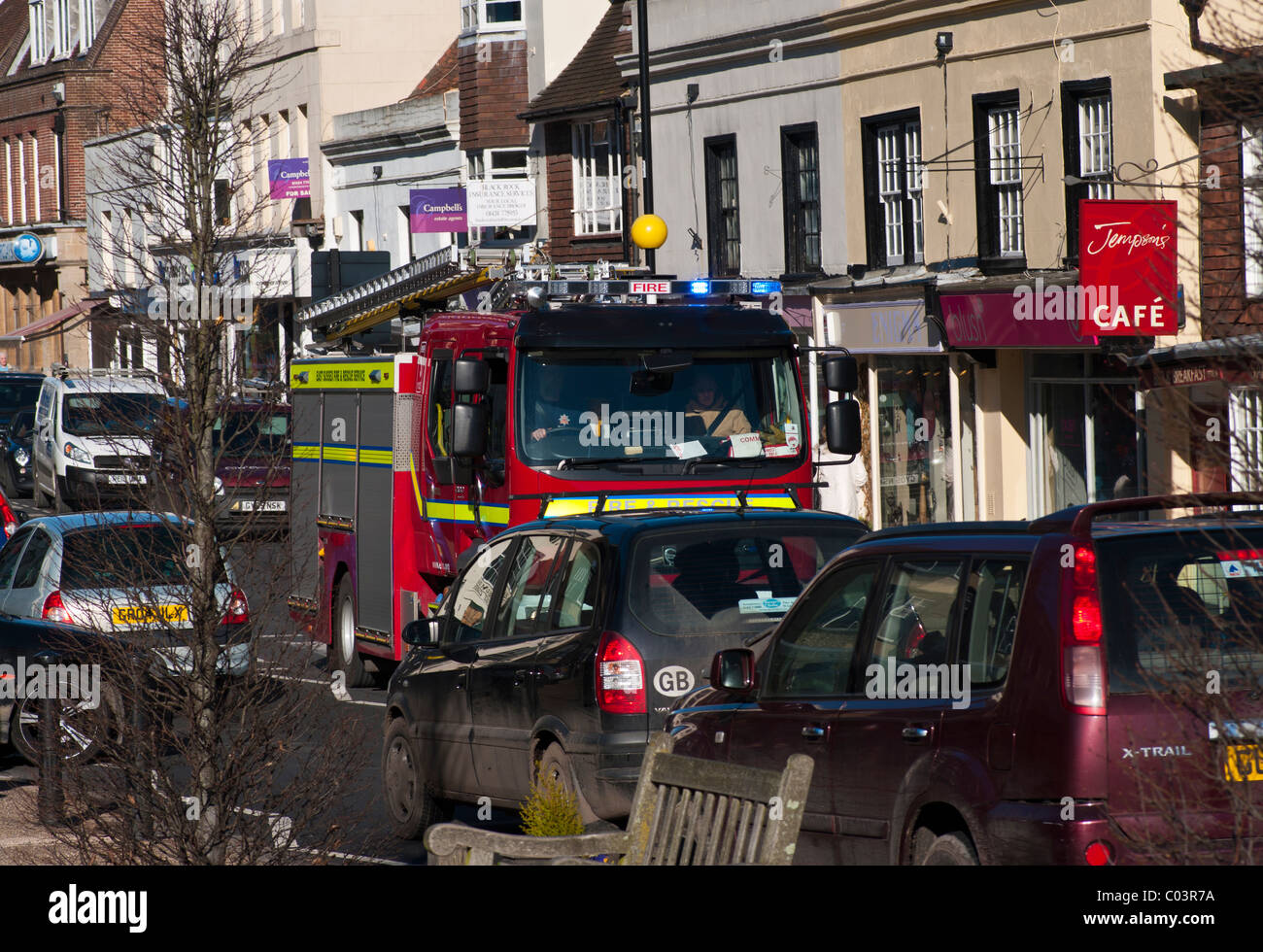 Fire Truck Engine Struggling Through High Street Traffic Stock Photo ...