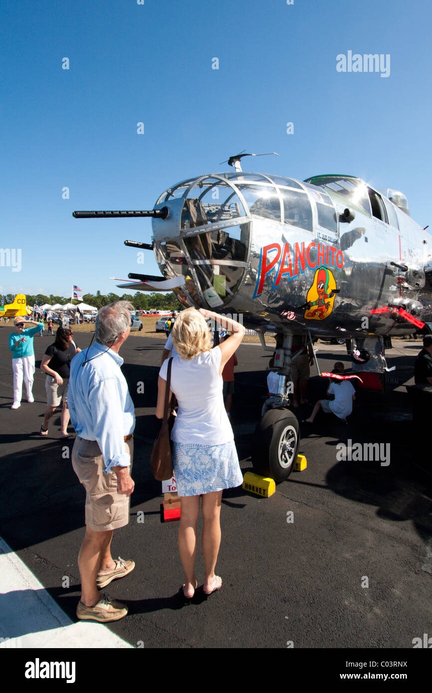 Spectators look at a B25 Mitchell aircraft at the Stuart Air Show 2010 ...