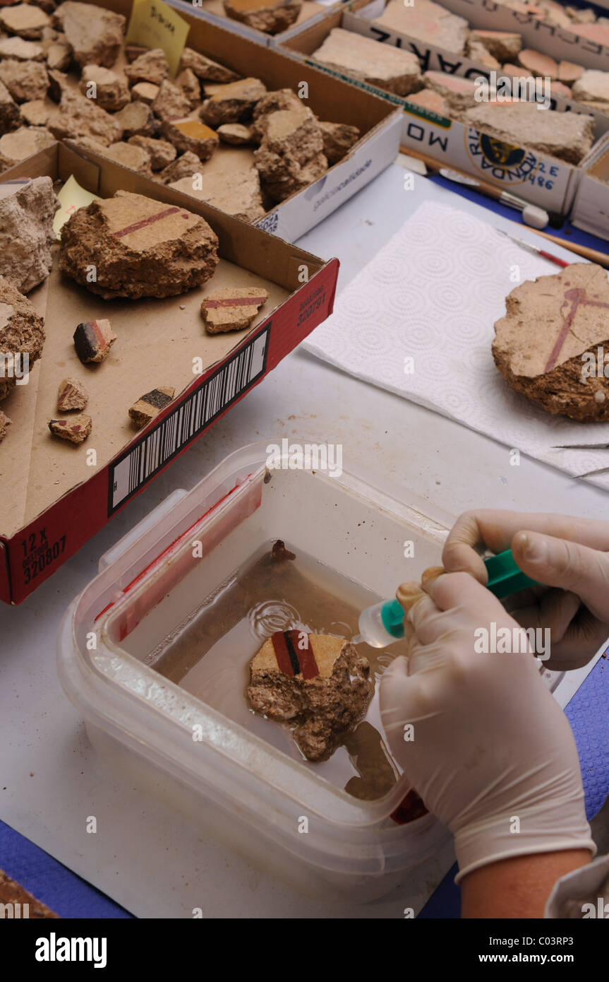 Restoration of Roman wall painting in the museum - Archaeological site ...