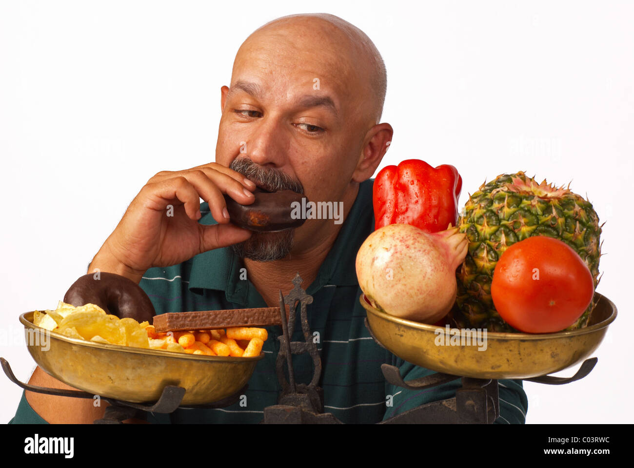 Giving in to temptation, failing to keep up the diet Stock Photo - Alamy