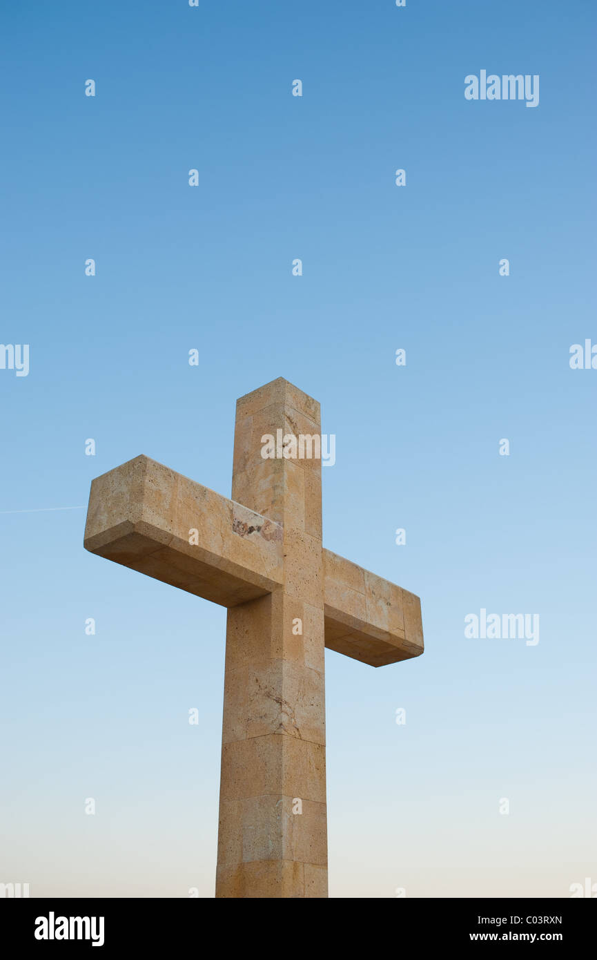 Huge stone cross monument against evening sky Stock Photo - Alamy
