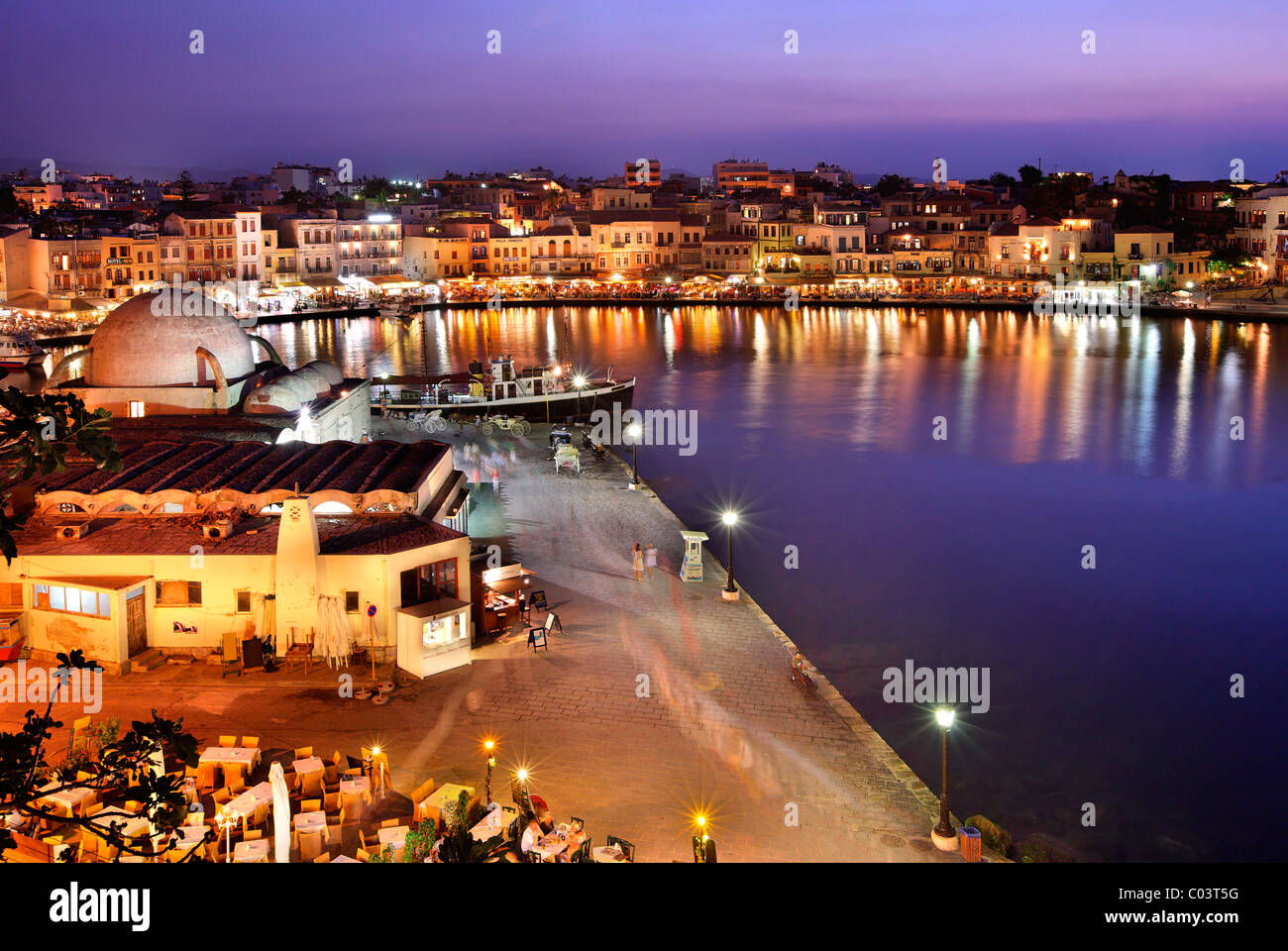 The old Venetian harbor of Hania town in the "blue" hour, Crete island ...