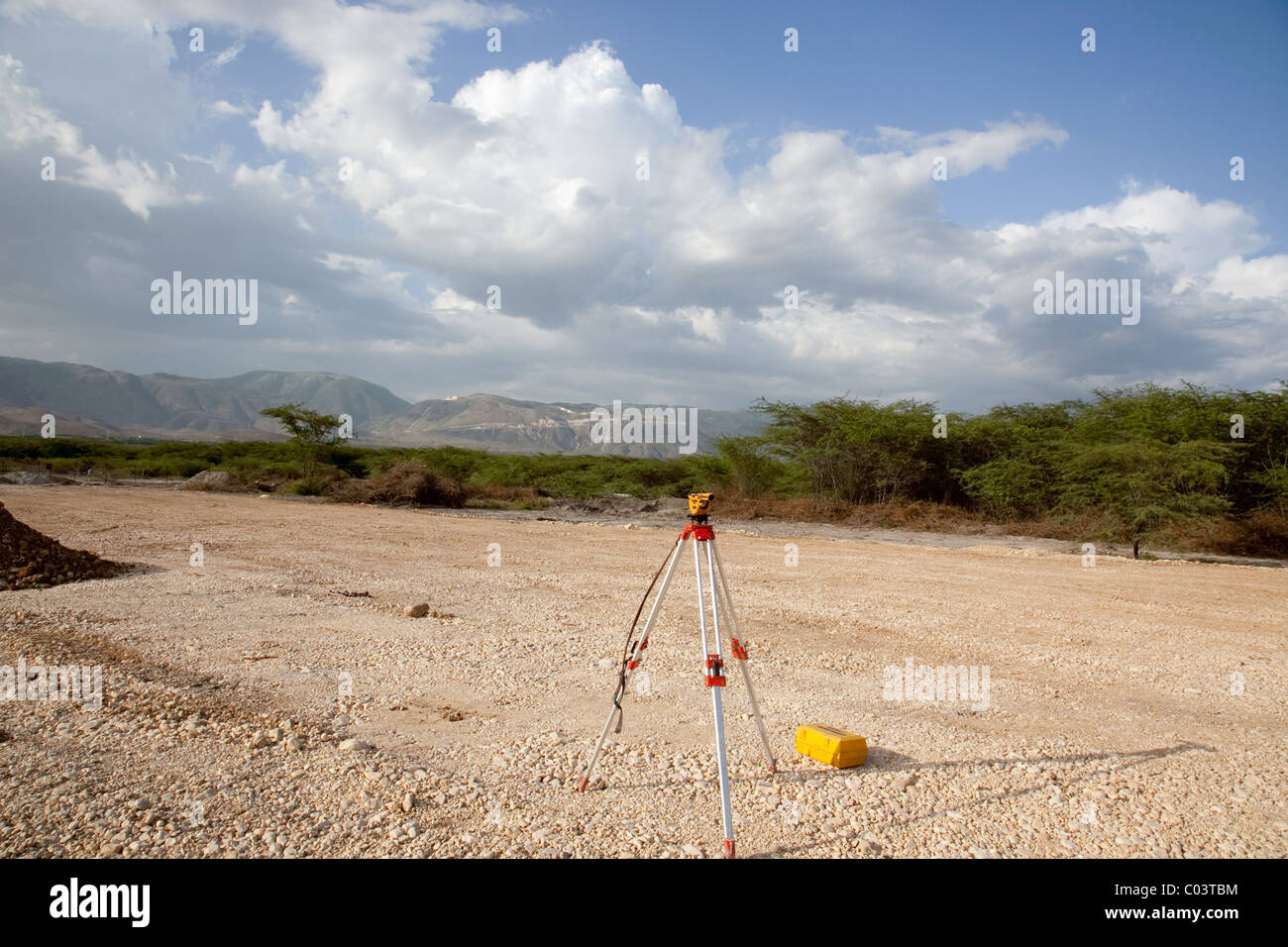 Survey level and transit in building site Stock Photo - Alamy