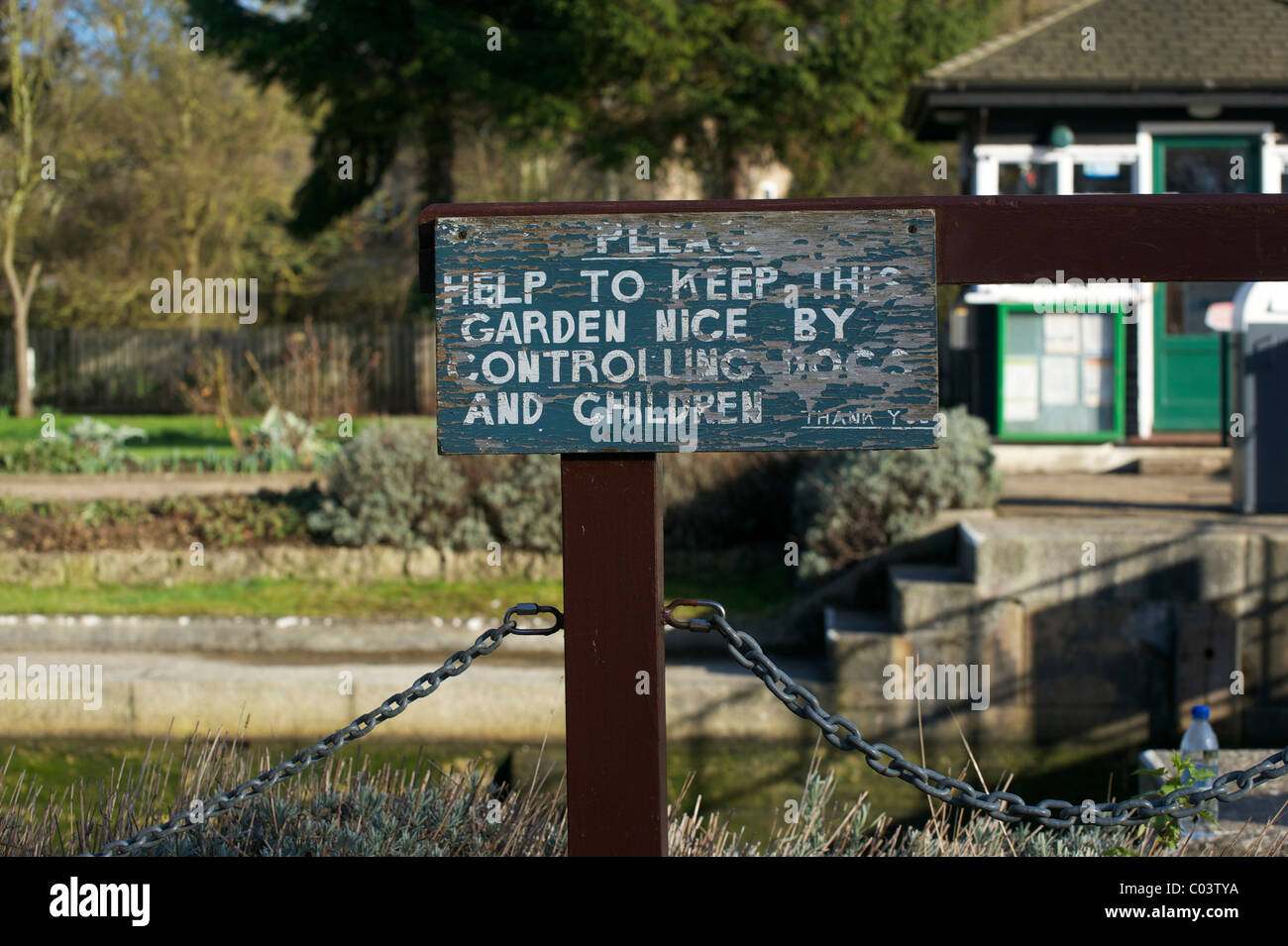 A 'keep dogs and children under control' sign Stock Photo - Alamy