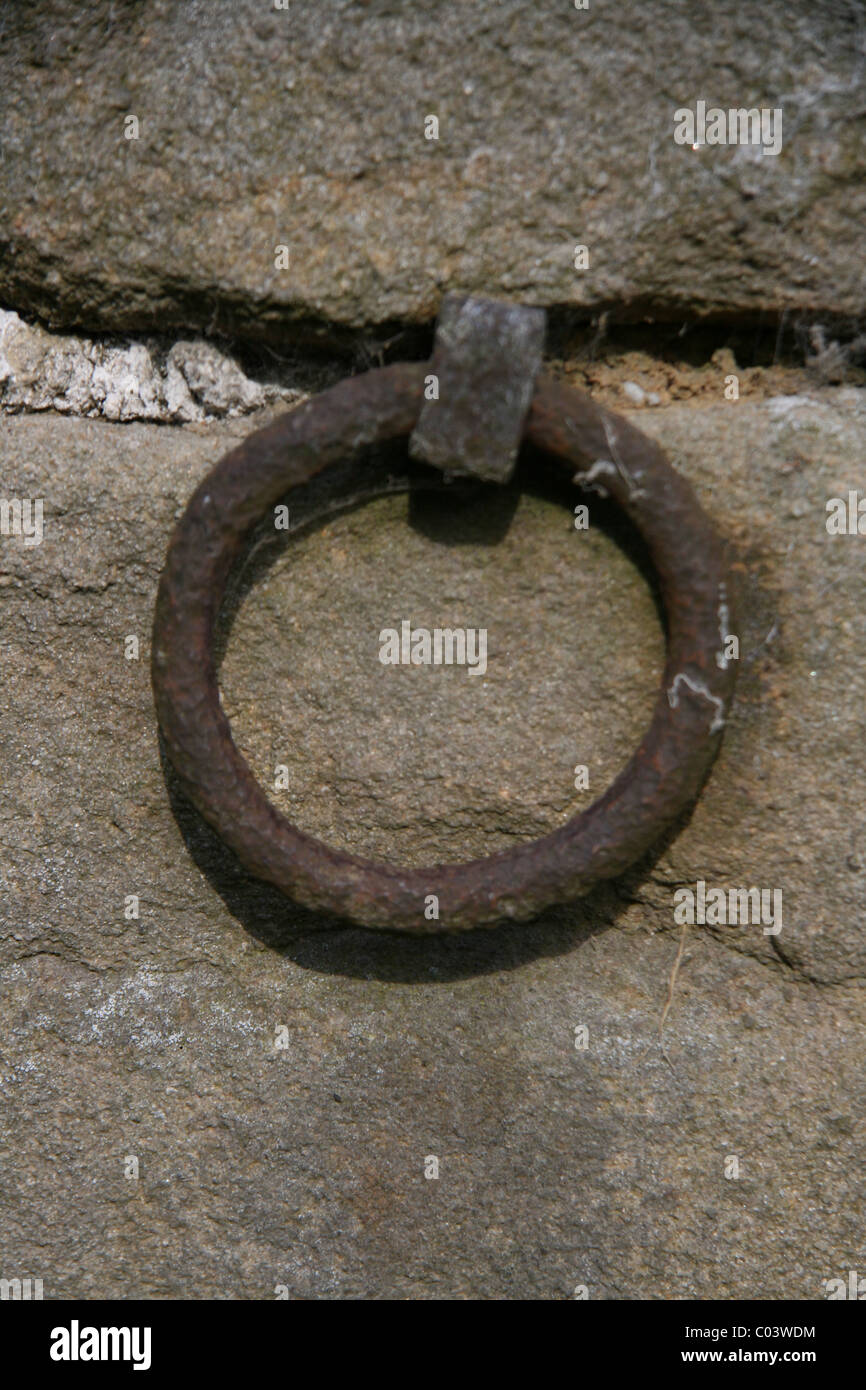 ring to tether animals within stone wall Stock Photo - Alamy
