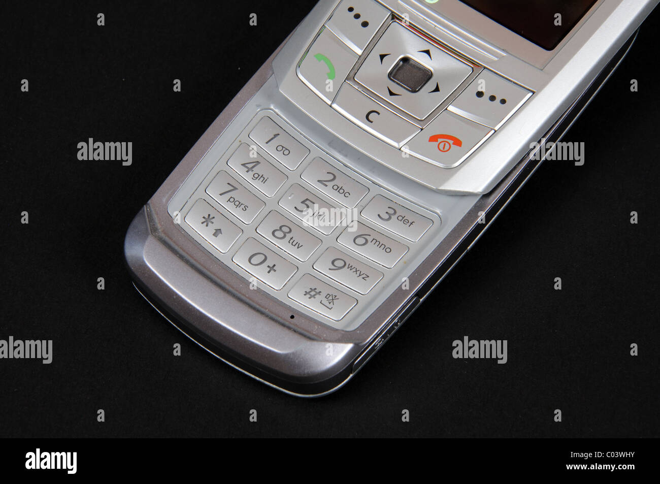 Silver mobile phone, Spain, Western Europe Stock Photo - Alamy