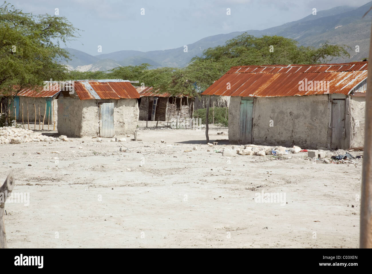 Haitian house with tin roof and mountains in the background Stock Photo ...