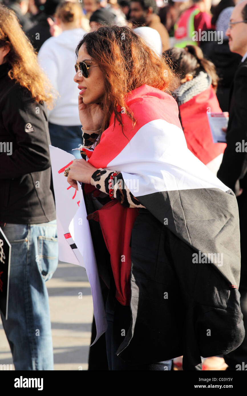 Protester covered in a flag. In solidarity, in defiance: global day of ...