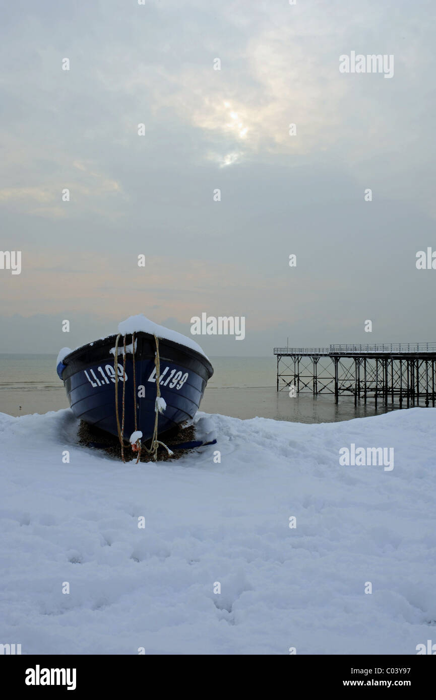 Fishing boat in the snow Stock Photo - Alamy