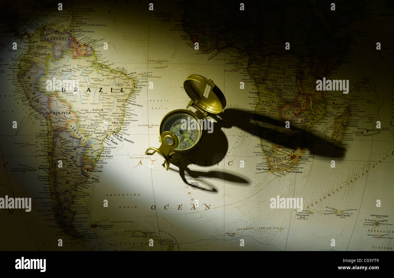 world map and compass Stock Photo - Alamy
