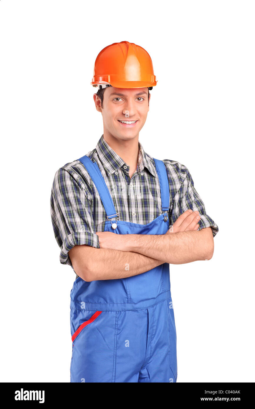 Manual worker wearing blue overall and helmet Stock Photo - Alamy