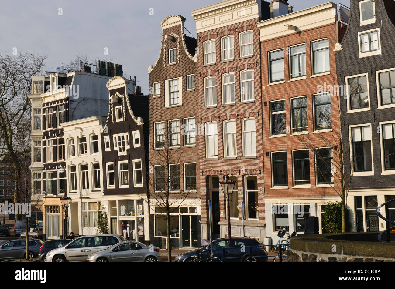 Uneven buildings in Amsterdam Stock Photo - Alamy