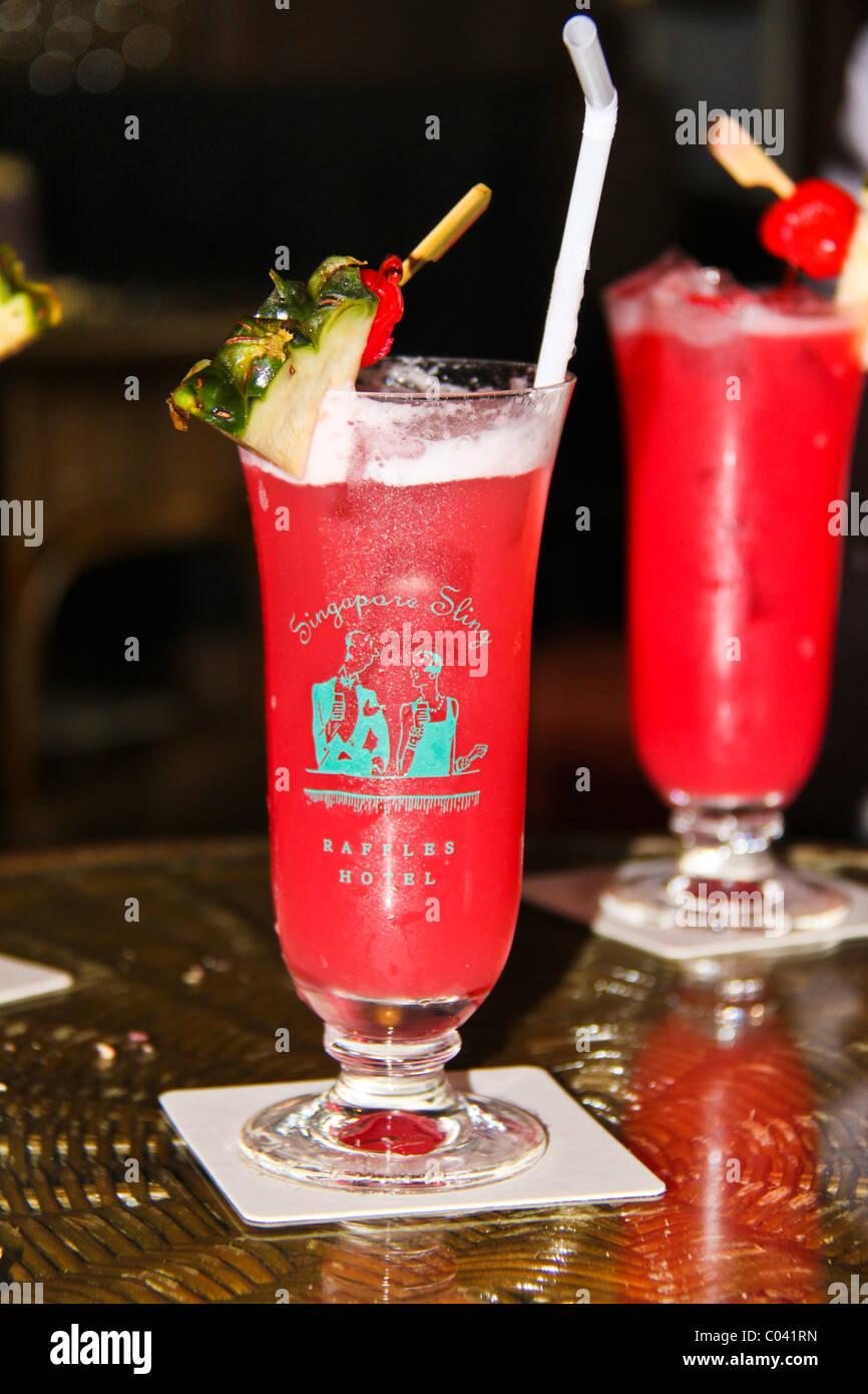 Singapore Sling, a famous cocktail in the Raffles Hotel Long Bar Stock ...