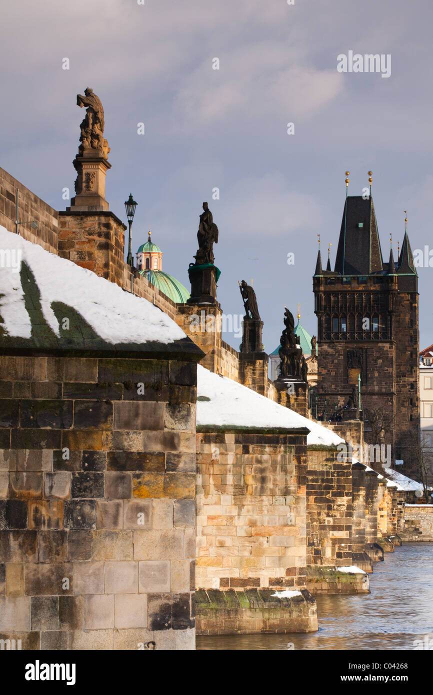 Famous Charles bridge on Vltava river in Prague in winter Stock Photo ...