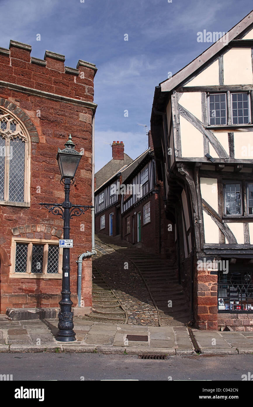 Entrance to Stepcote Hill steps flanked by historic metal lampost and ...