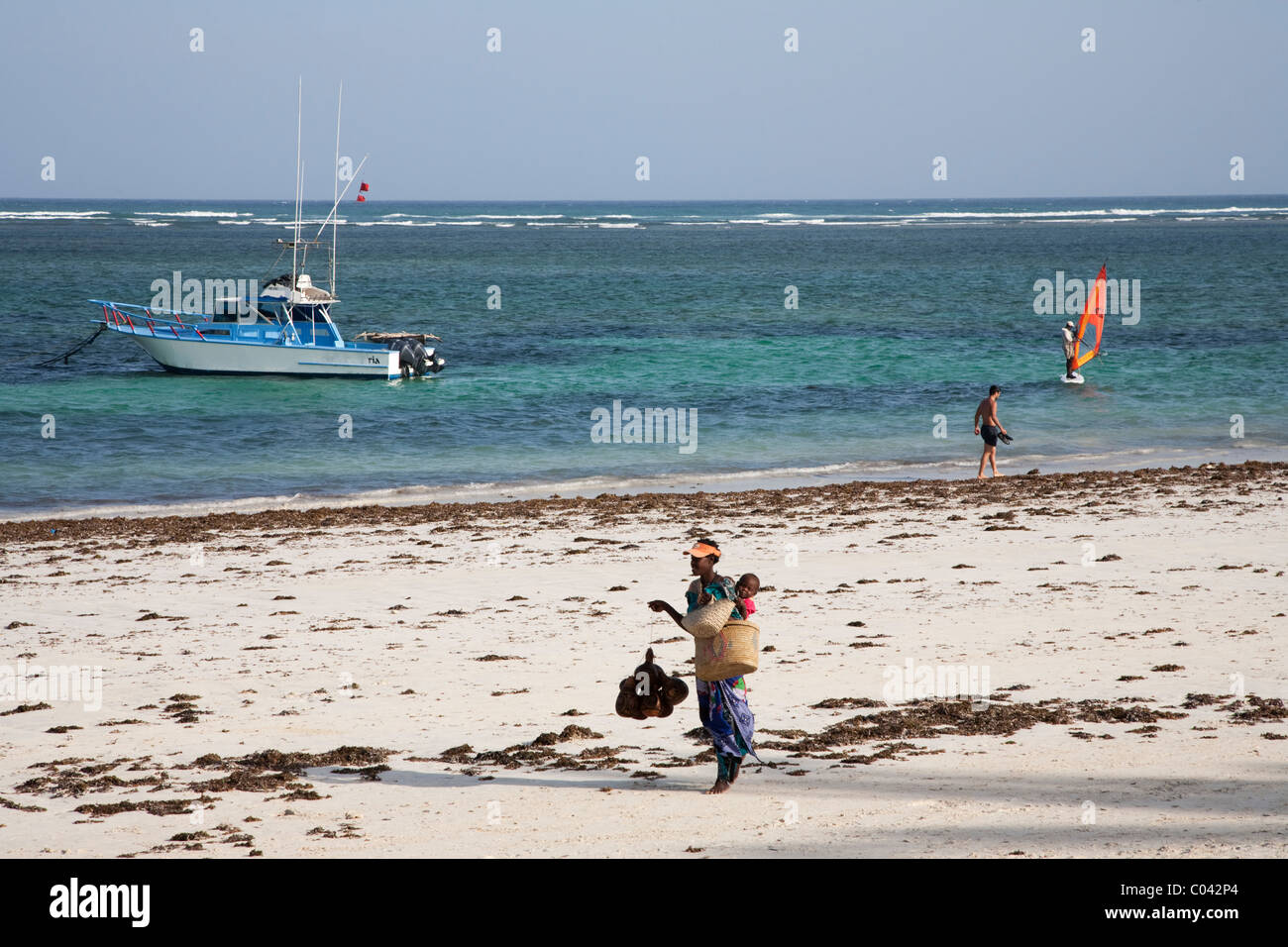 Baby strapped to back hi-res stock photography and images - Alamy