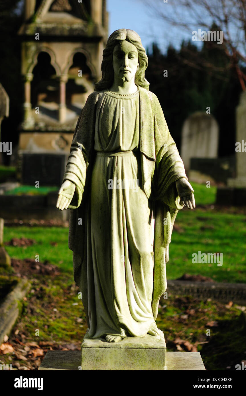 Stone Statue of Jesus Christ In A Cemetery Stock Photo - Alamy