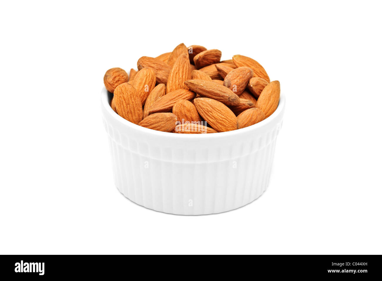 Almonds in porcelain bowl Stock Photo - Alamy