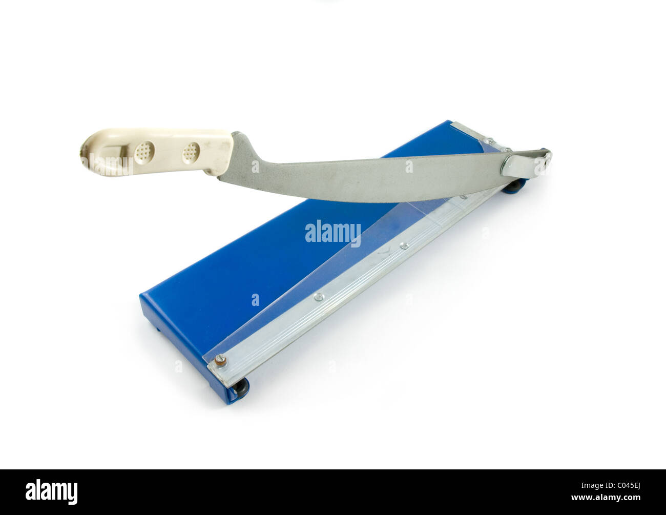 Paper cutter on white background Stock Photo - Alamy