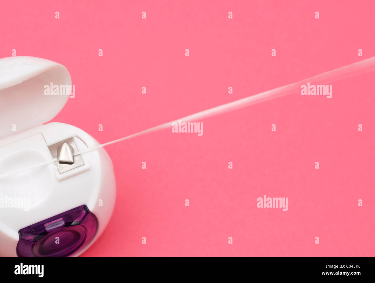 pulled dental floss Stock Photo - Alamy