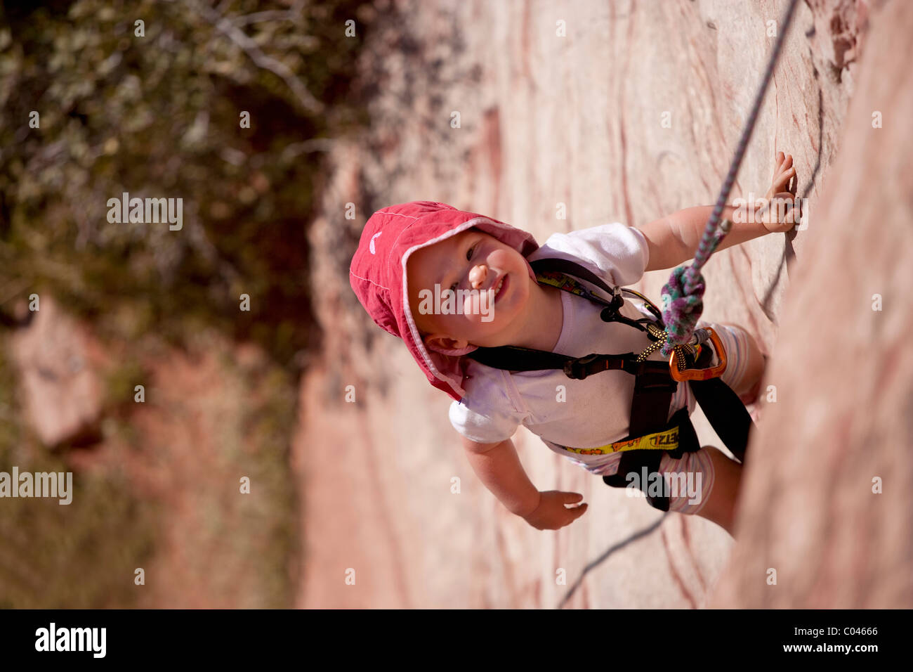 Little girl rock climbing in Red Rock Canyon National Conservation Area ...