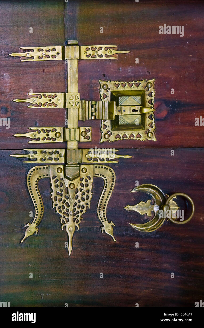 Decoration on traditional lock on door, Kerala, India Stock Photo - Alamy