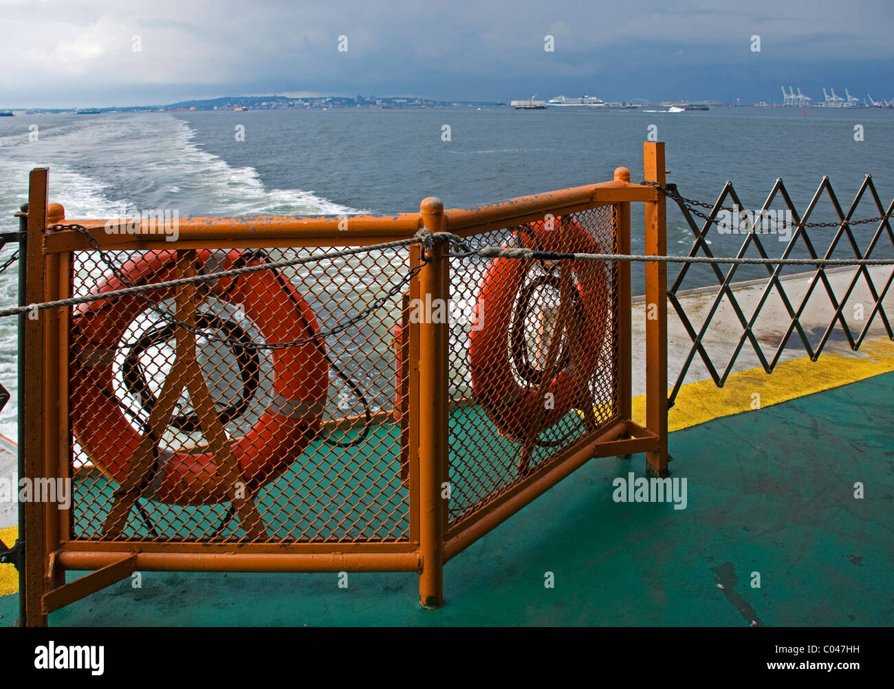 View looking back across harbor from aft deck of Ferry leaving Staten ...
