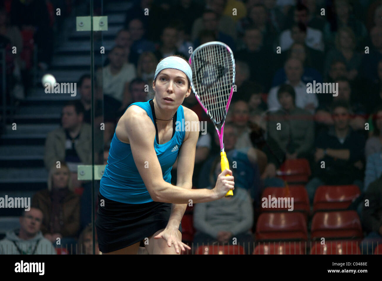 Madeleine Perry plays a backhand during the British Squash National ...