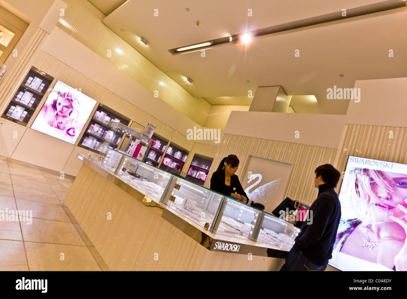 Shoppers in department store Stock Photo - Alamy