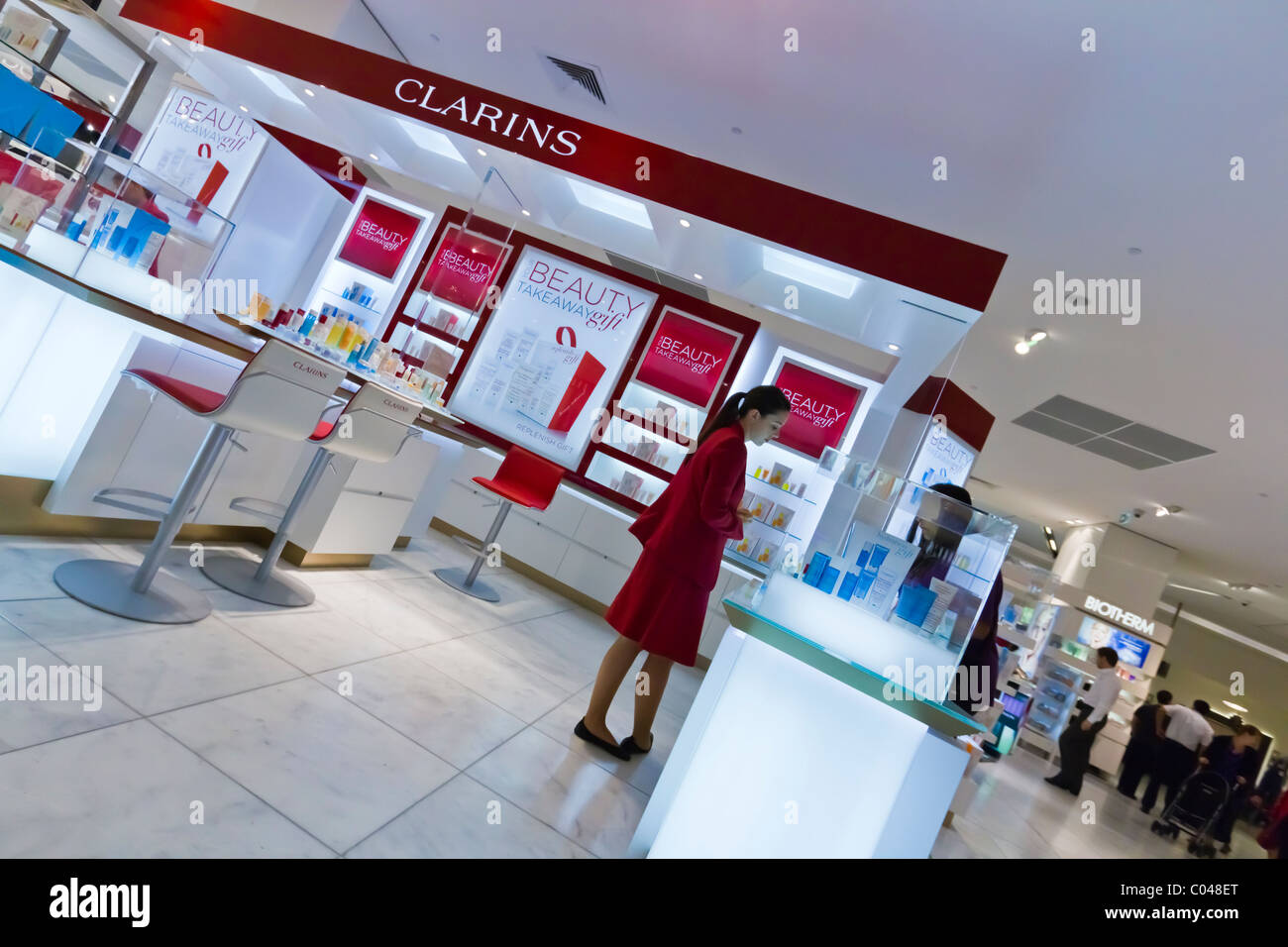 Shoppers in department store Stock Photo - Alamy