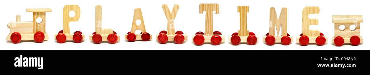 The word "Playtime" written with letters from a toy train Stock Photo ...