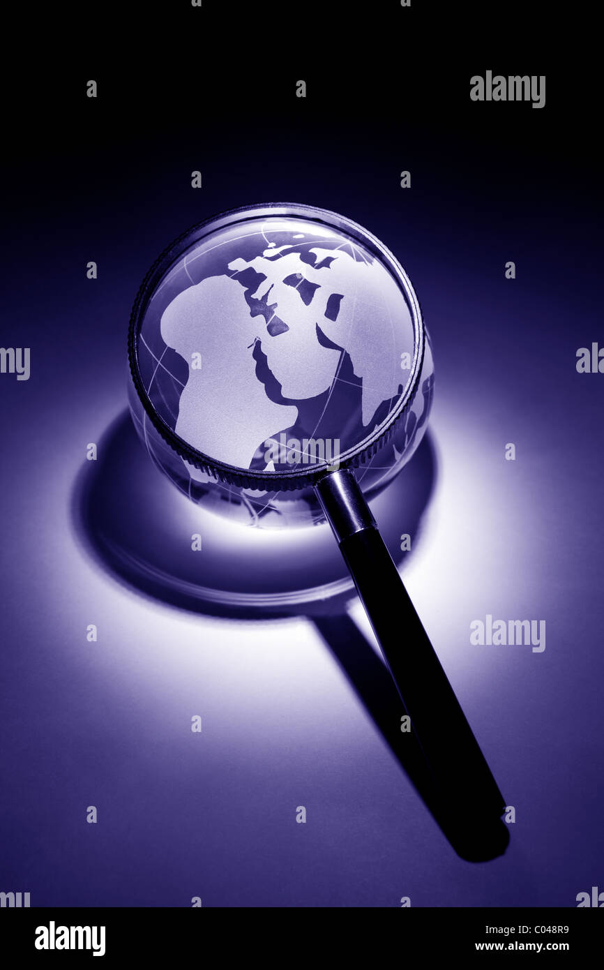 Magnifying glass globe hi-res stock photography and images - Alamy